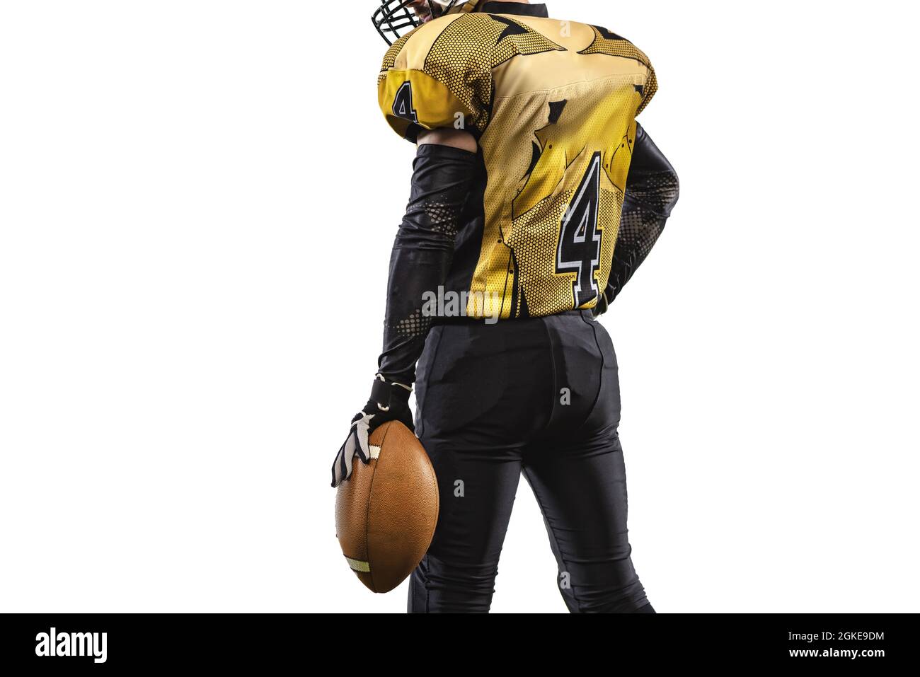 Cropped back view portrait of professional american football player in ...