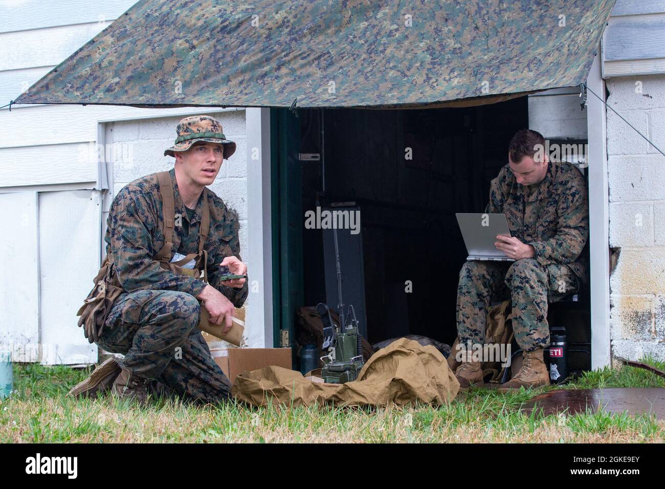 U.S. Marine Corps Sgt. Mitchell Firgens, a radio supervisor with ...