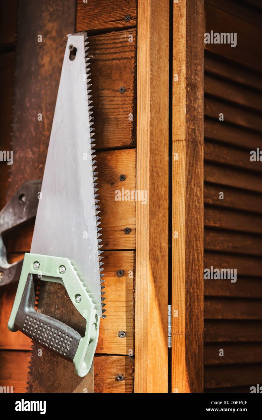 Hand saw hanging hi-res stock photography and images - Alamy