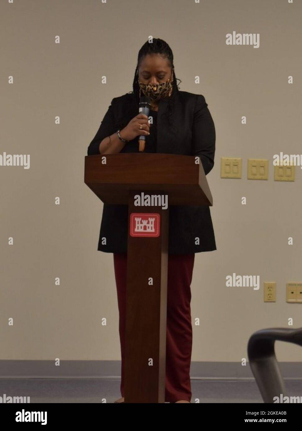 Jessie Lindor, Far East District property book officer, performs a poem ...