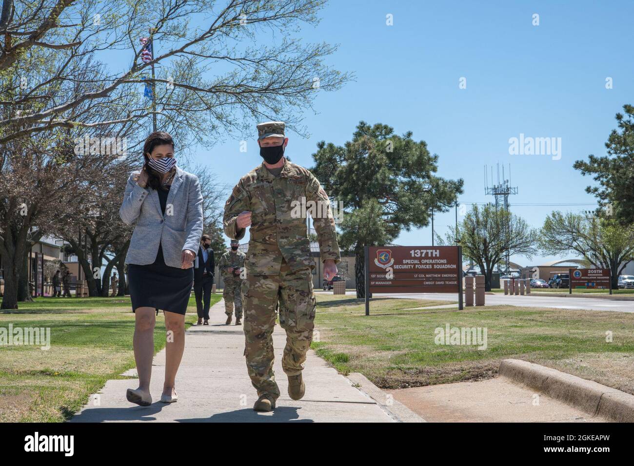 U.S. Rep. Stephanie Bice walks alongside Col. Daniel Fowler, wing ...