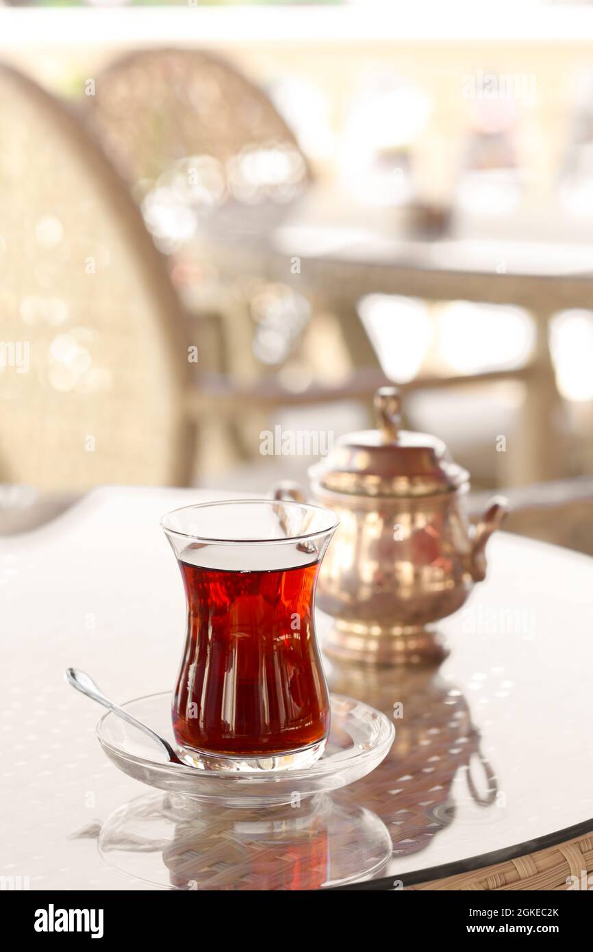 Turkish tea in traditional glass on table Stock Photo - Alamy