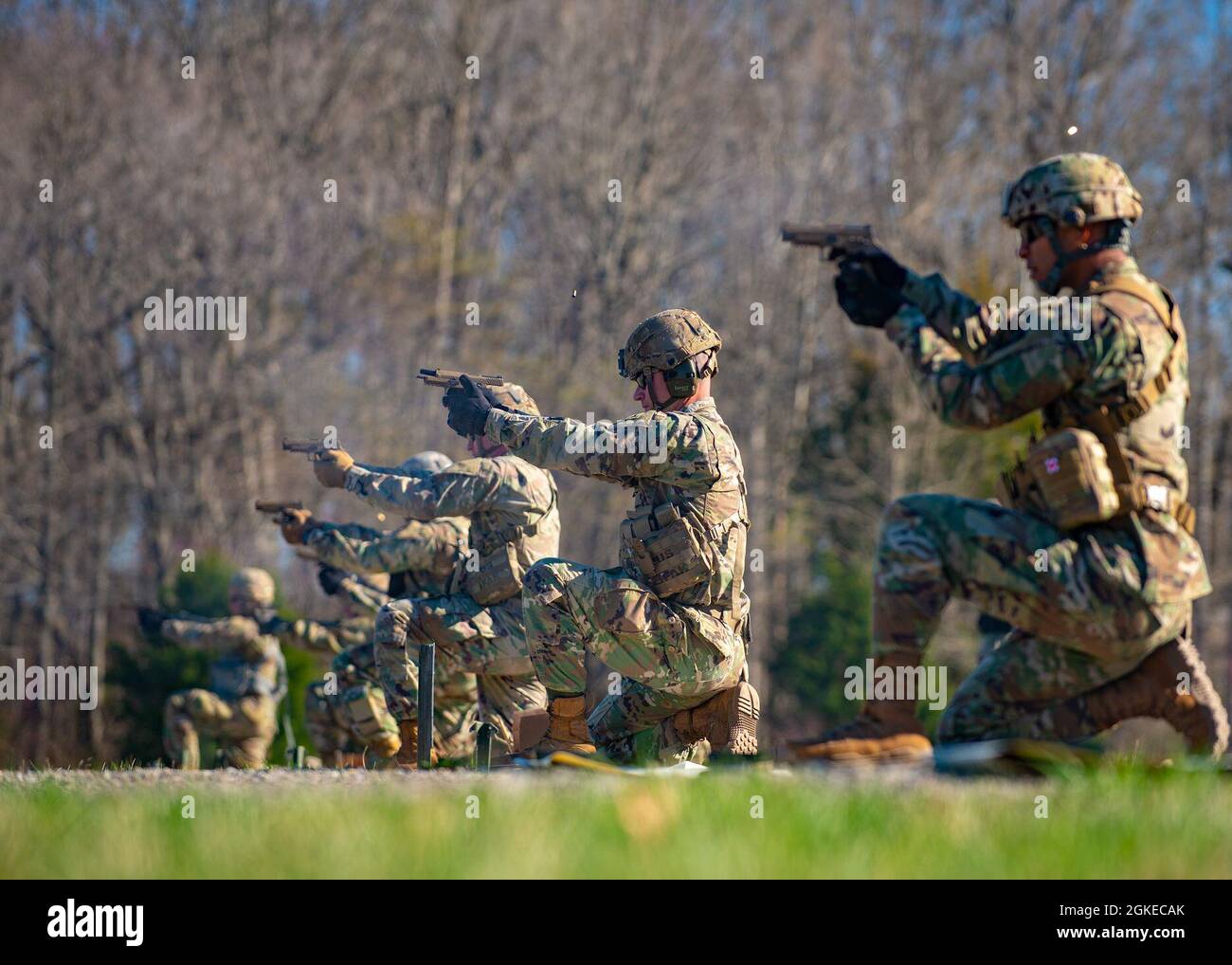 Spent cartridges fly as Sgt. 1st Class Ronald Roden and other ...
