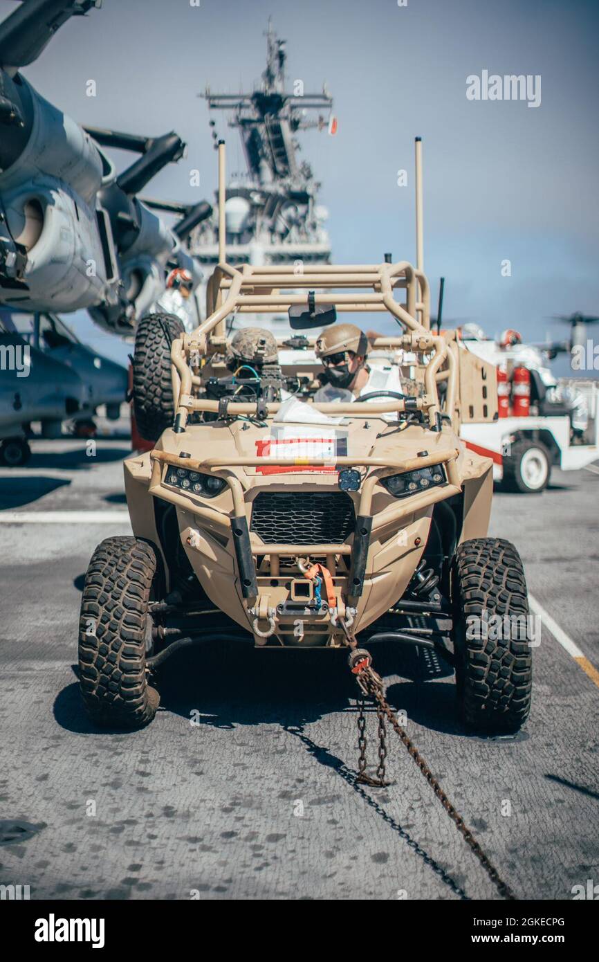 PACIFIC OCEAN (March 29, 2021) U.S. Marine Corps Sgt. Tyler Roup, left ...