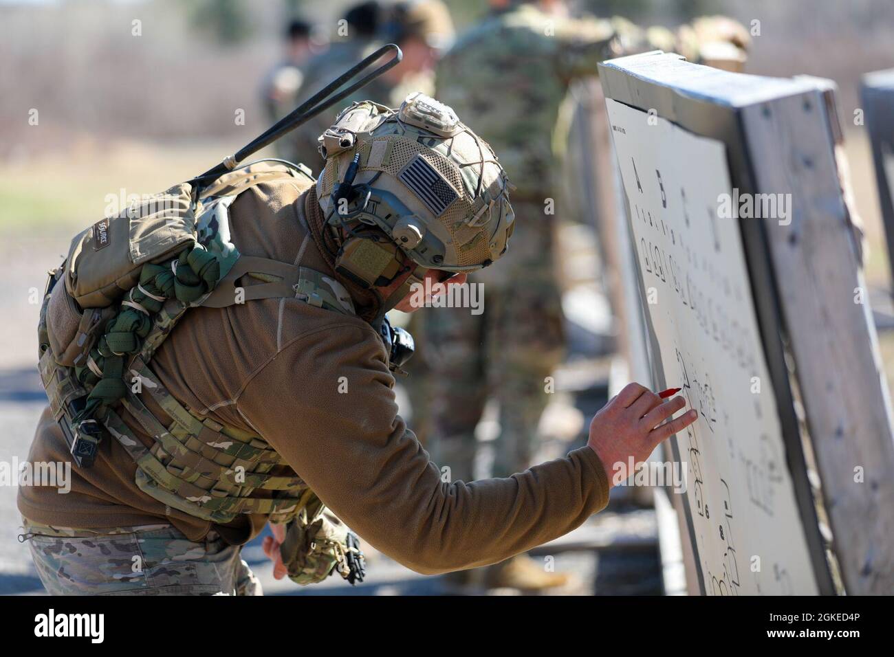A platoon sergeant with Bush Master Company, 2nd Battalion, 22nd ...