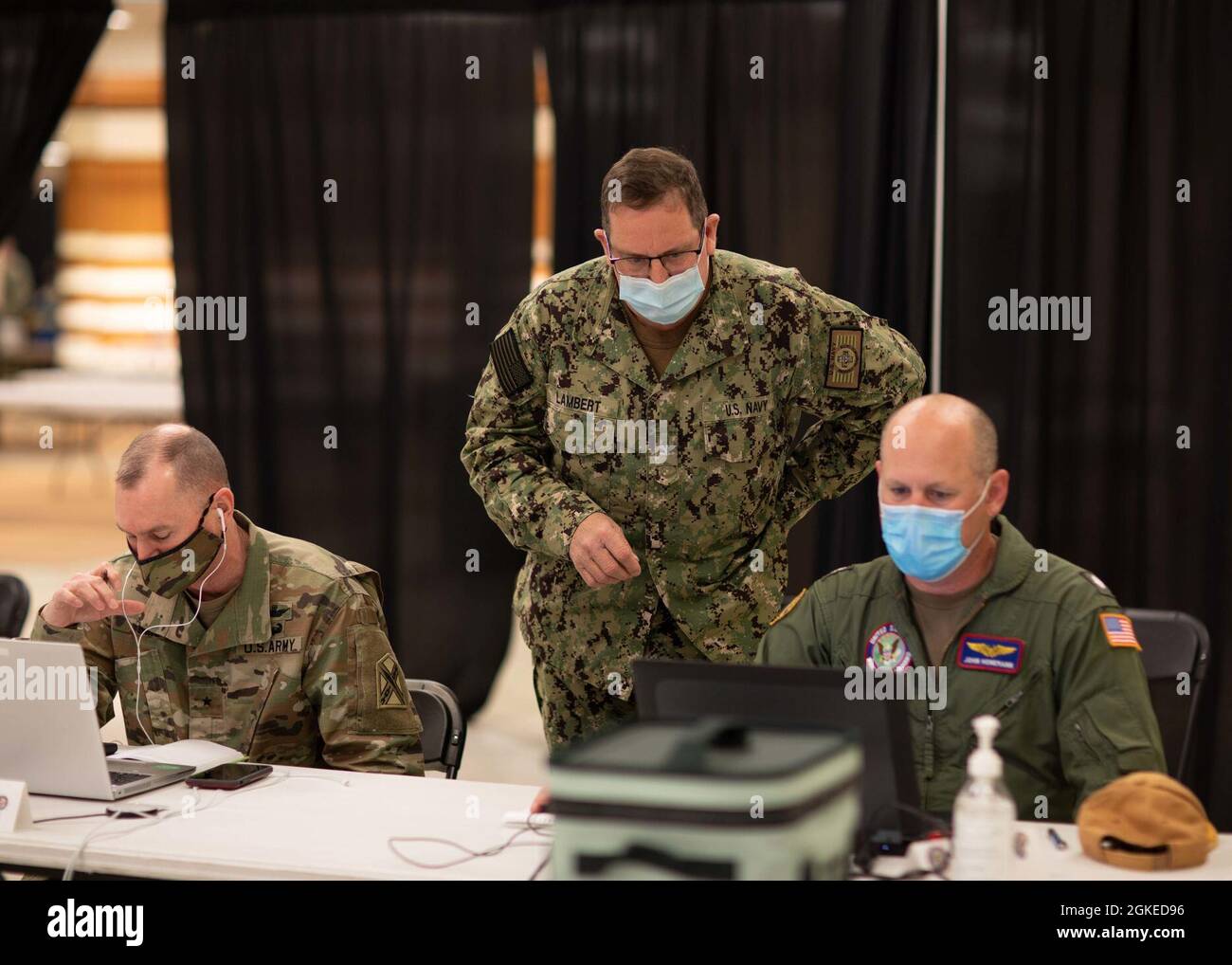 (From left to right) U.S. Army Brig. Gen. James Ring, the dual status ...
