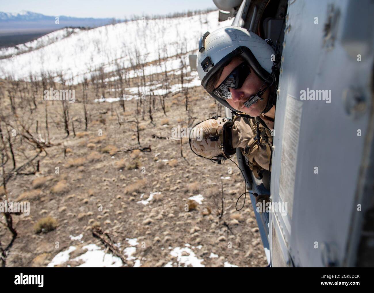 210330-N-PH222-1410 Fallon, Nev. (Mar. 30, 2021) Naval Aircrewman ...