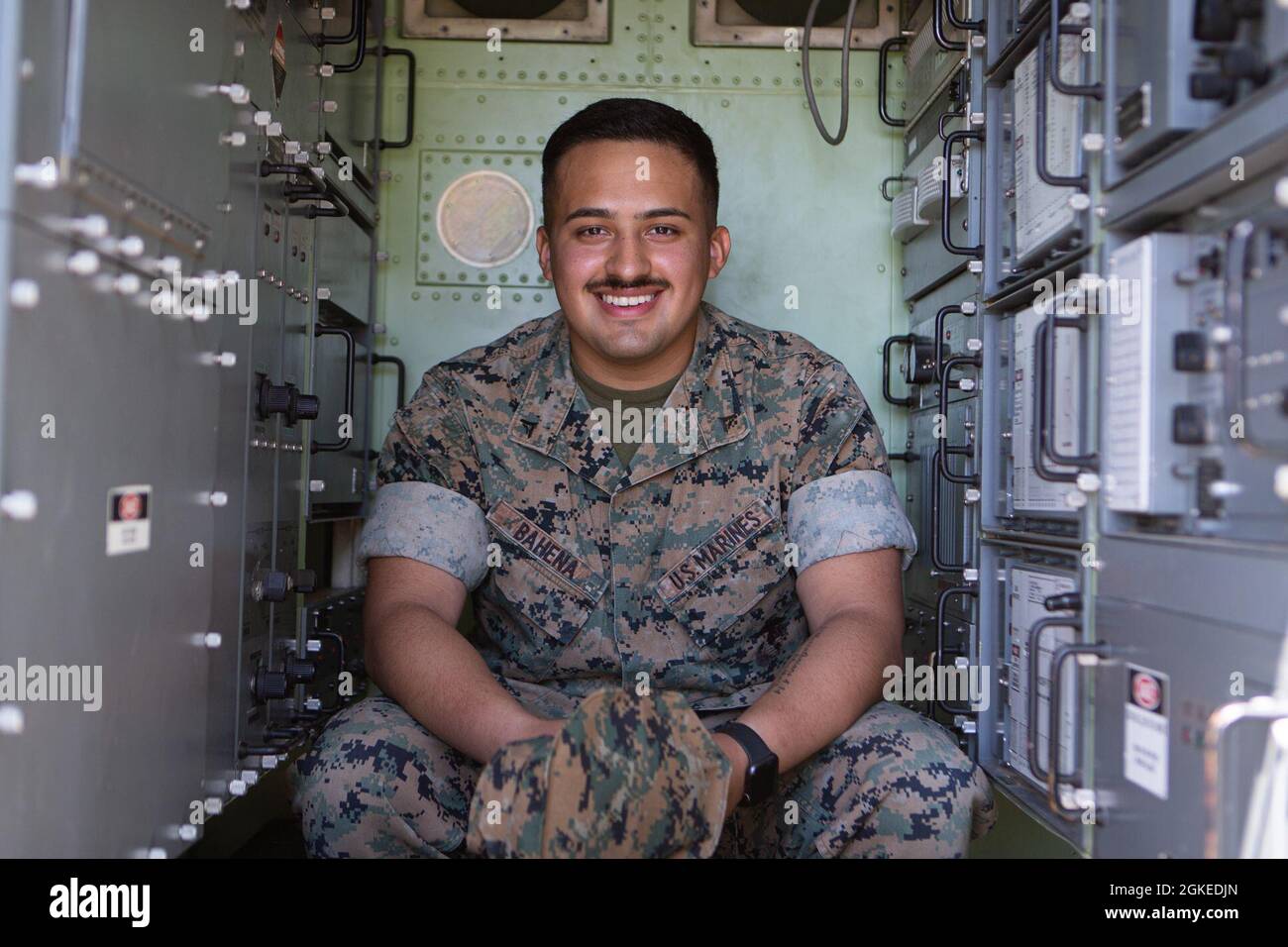 U.S. Marine Corps Lance Cpl. Art Bahena, a tropospheric scatter radio ...