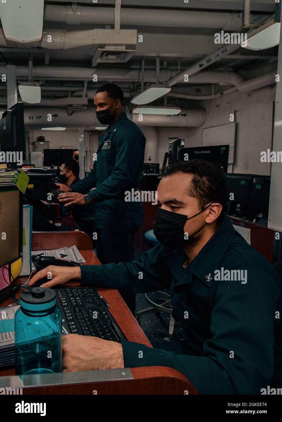 INDIAN OCEAN (March 30, 2021) – U.S. Navy Personnel Specialists update ...