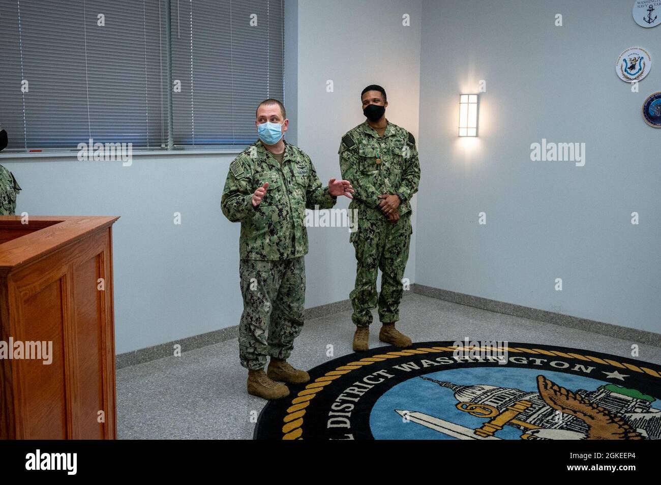 WASHINGTON, DC (March 30, 2021) – Cmdr. Anthony Militello (left), Naval ...