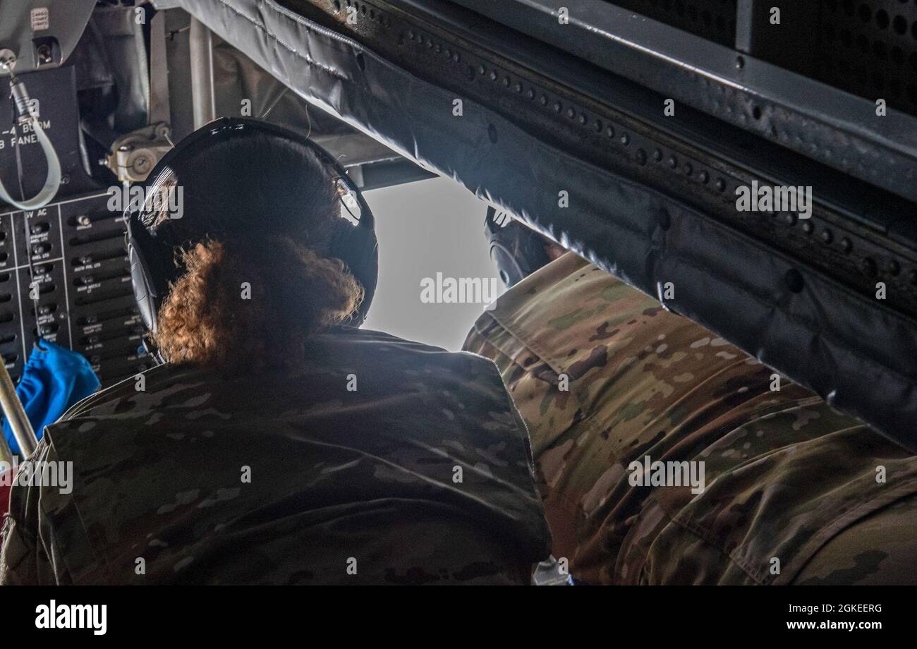 U.S. Air Force Chief Master Sgt. Shae Gee, 6th Air Refueling Wing command chief looks on as ...