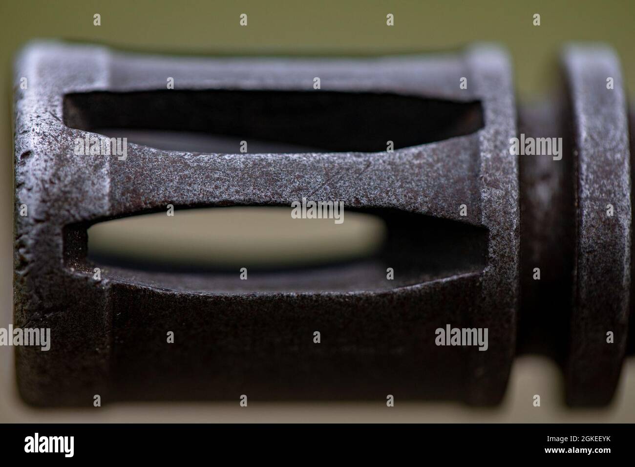 The muzzle of an M16A4 service rifle is shown in detail as a recruit ...