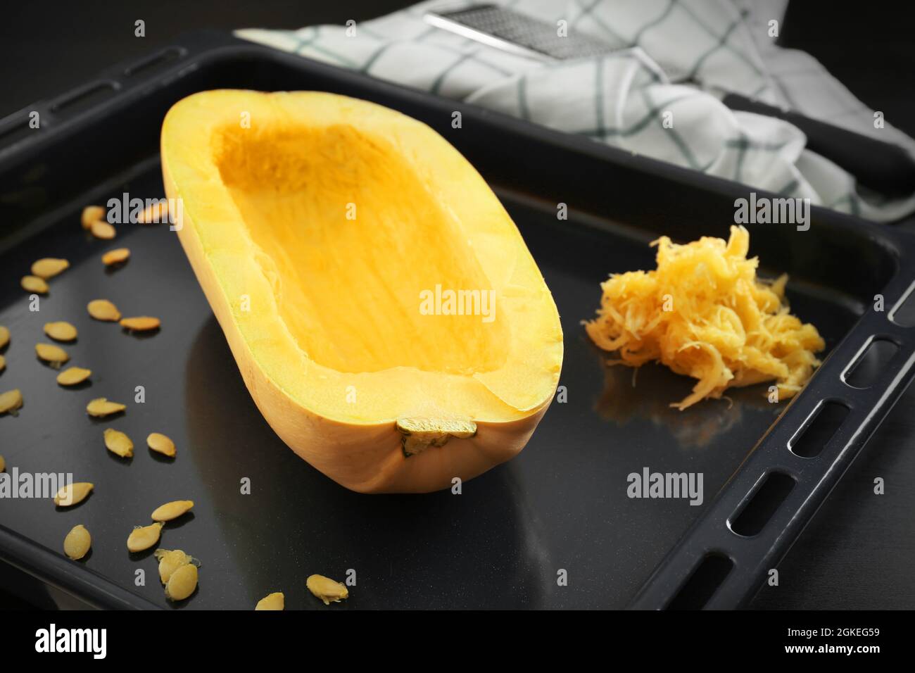 Half of fresh spaghetti squash on baking sheet Stock Photo - Alamy