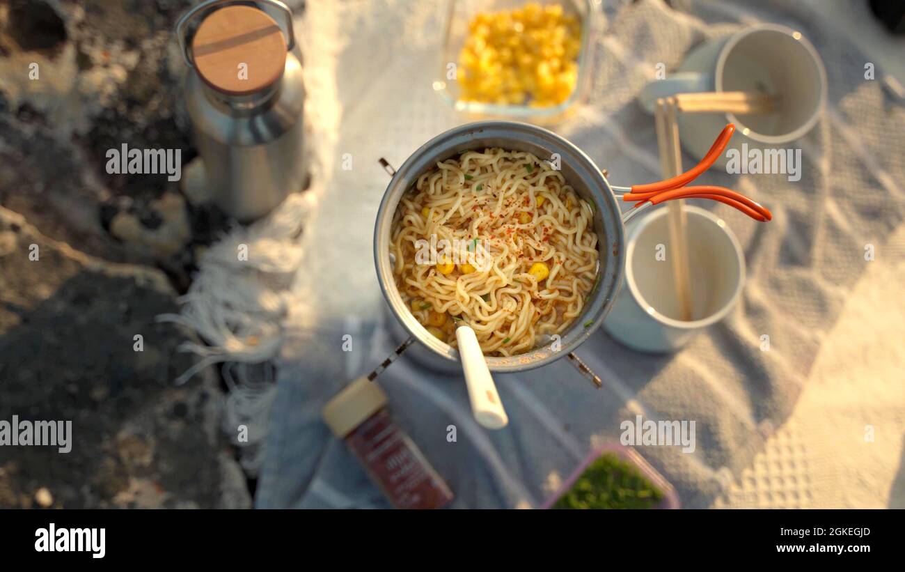 A top view of noodles cooking outdoor Stock Photo - Alamy