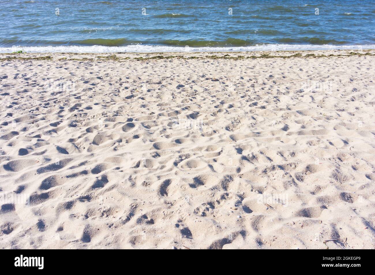 Sandy beach on a sunny day Stock Photo - Alamy