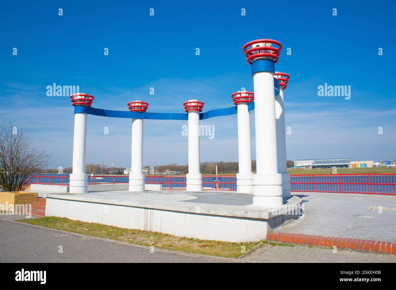 POZNAN, POLAND - Nov 01, 2014: A row of pillars by the Malta lake and a ...
