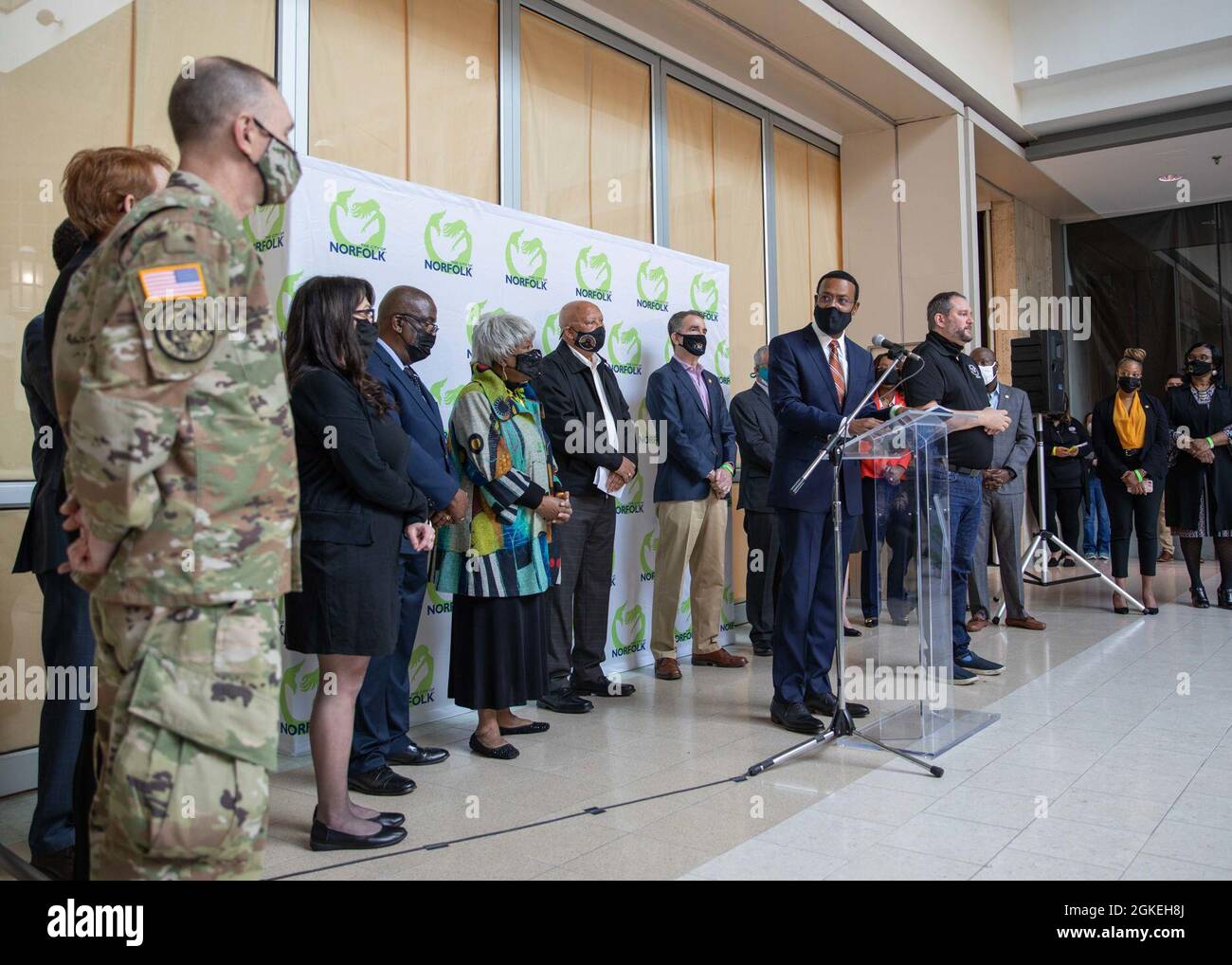 Norfolk Mayor Kenneth Cooper, center, thanks U.S. Army Brig. Gen. James ...