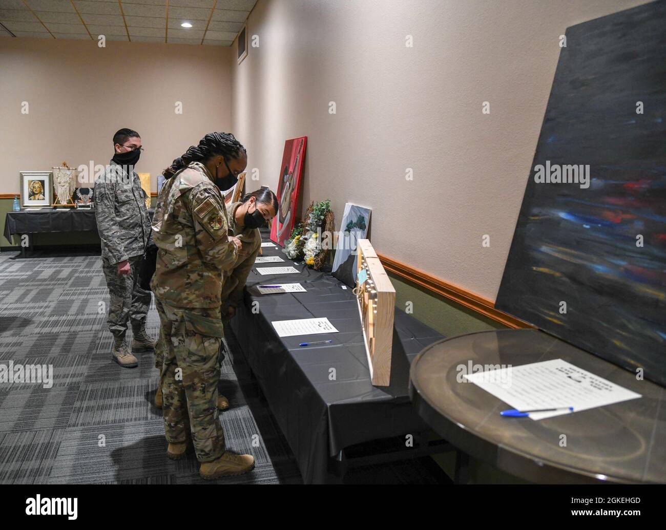 Team Minot Airmen attend the Women’s History Month finale event on ...