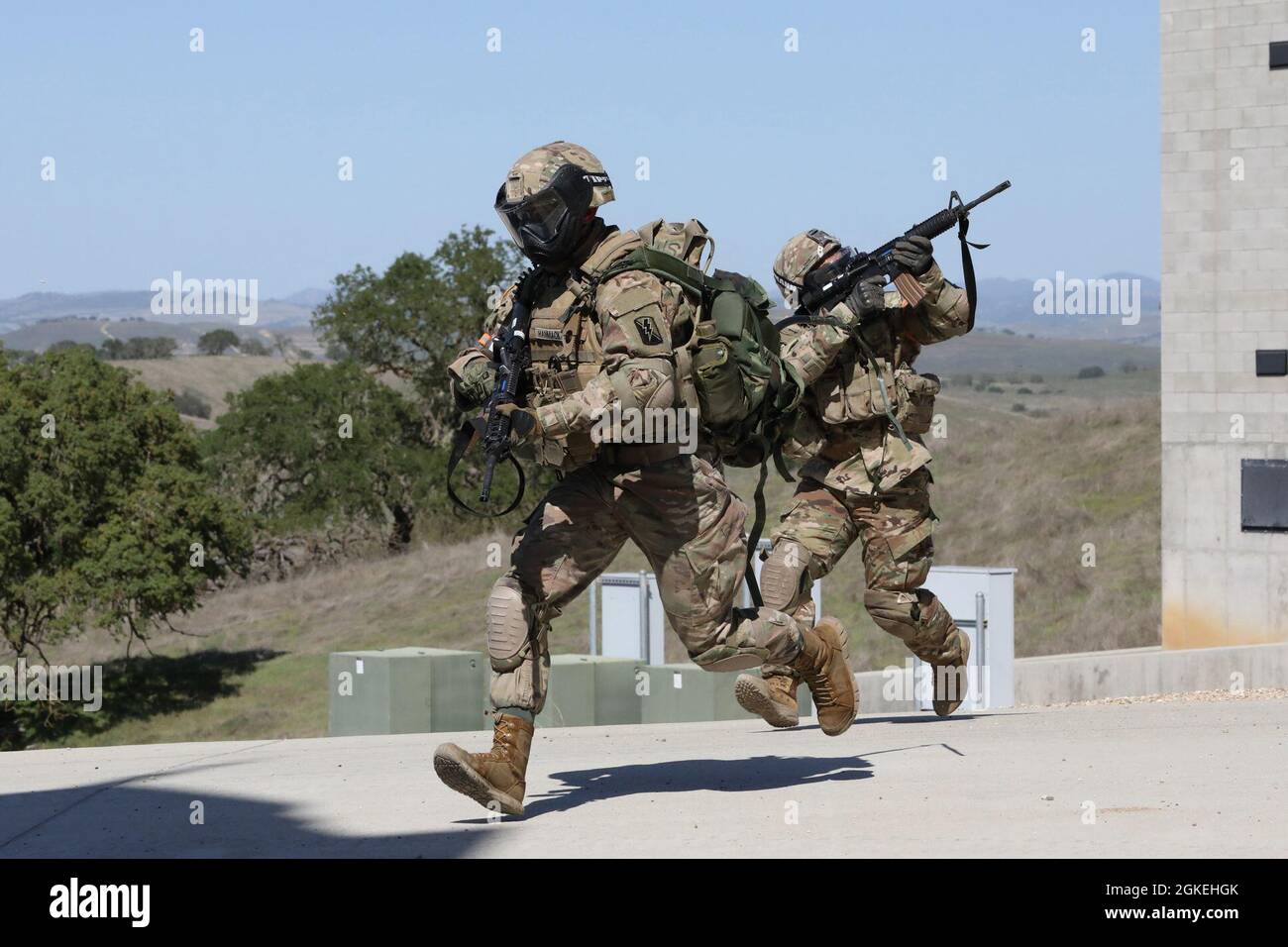 U.S. Army Spc. Alex Hammack and Sgt. Peter Ebilane, representing the ...