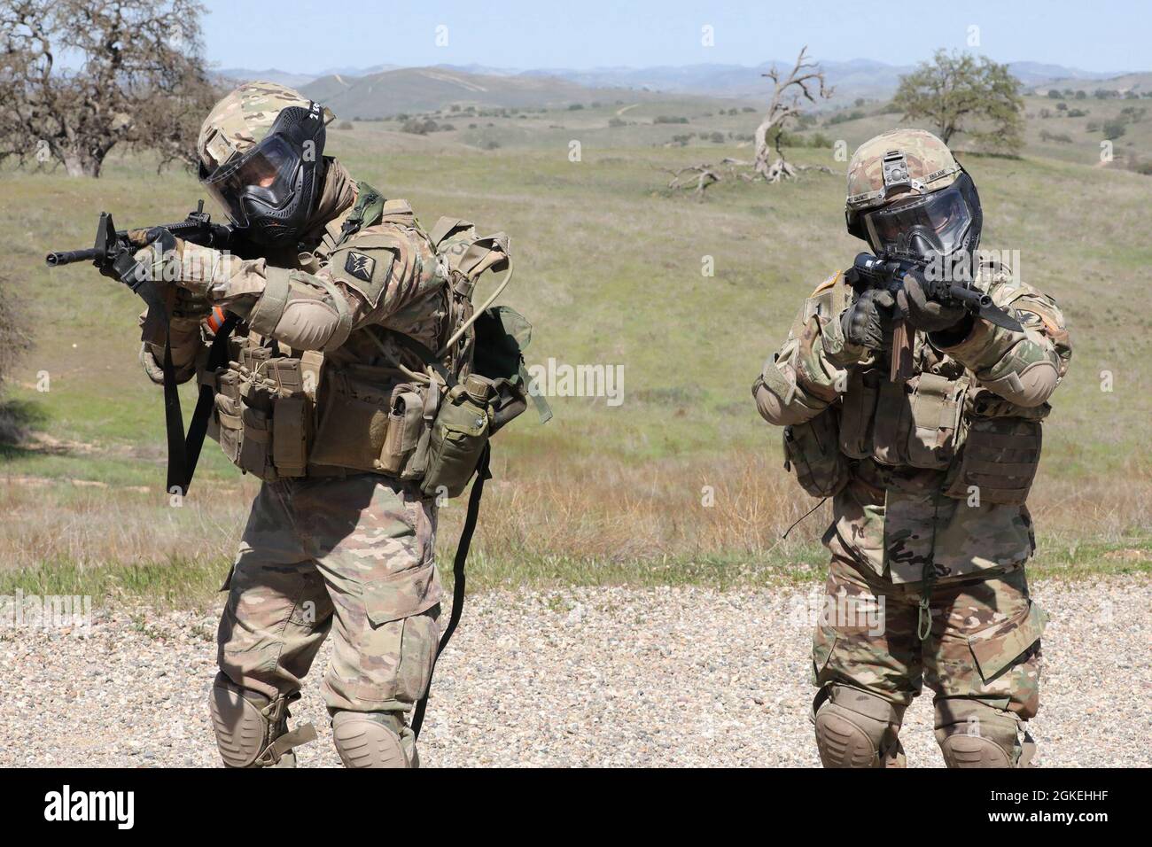 U.S. Army Spc. Alex Hammack and Sgt. Peter Ebilane, representing the ...