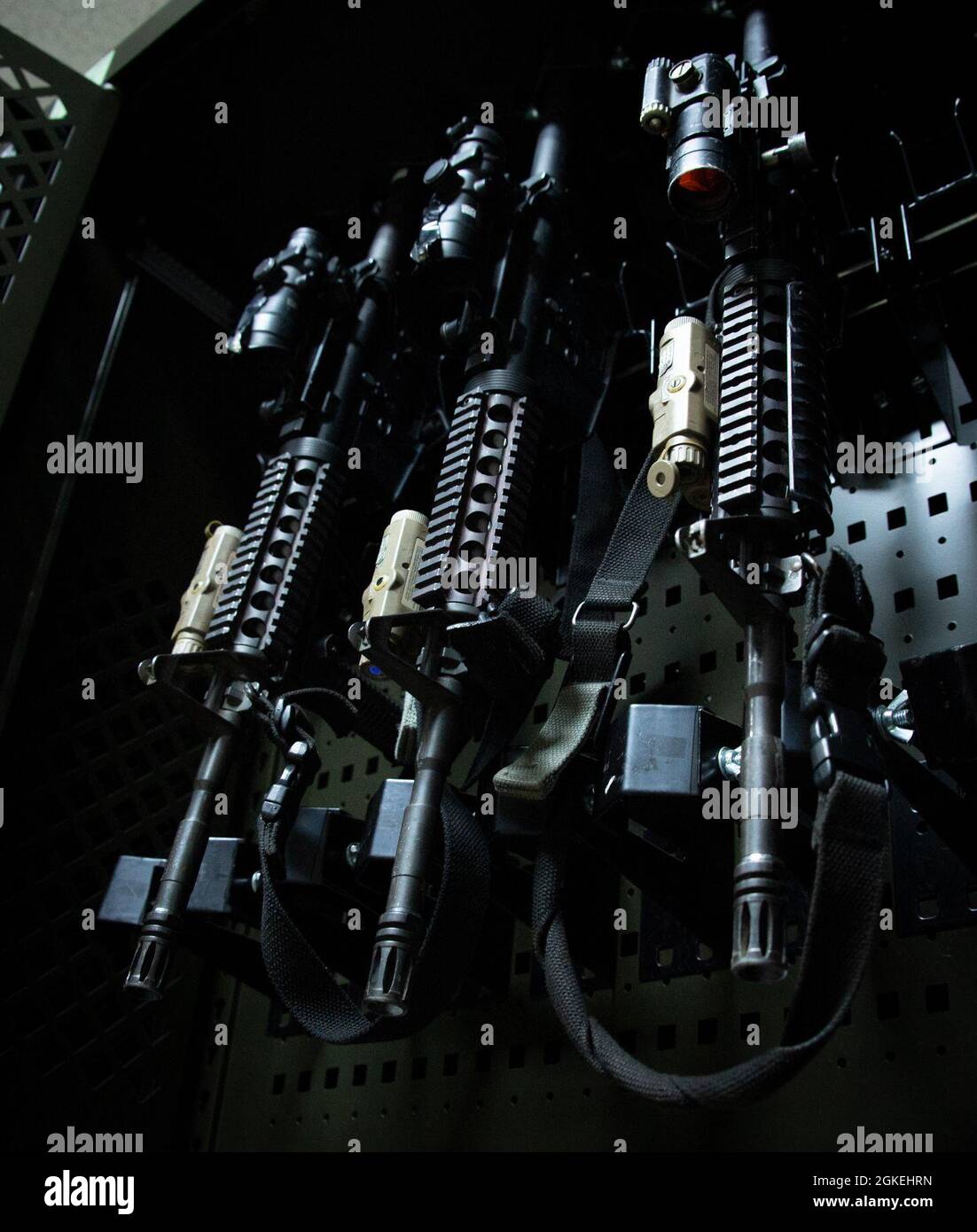 A rack of M4 rifles await assignment to defenders in the 39th Security ...
