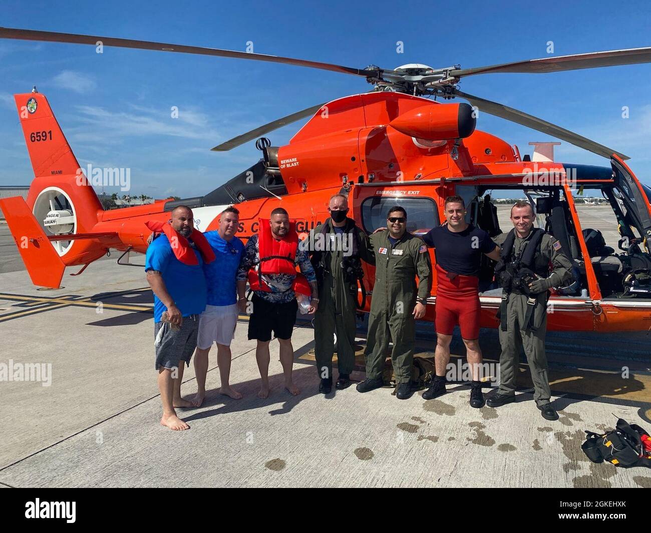 A Coast Guard Air Station Miami MH-65 Dolphin helicopter aircrew takes ...