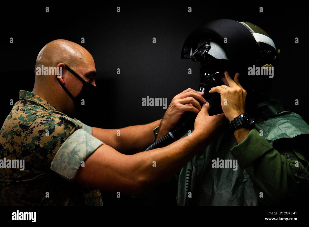 U.S. Marine Corps Staff Sgt. Klehibirth Murillo, left, non-commissioned ...