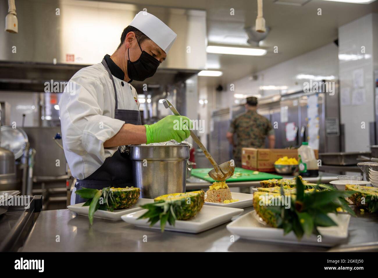 Takao Tatsugawa, a food service specialist with Headquarters and ...
