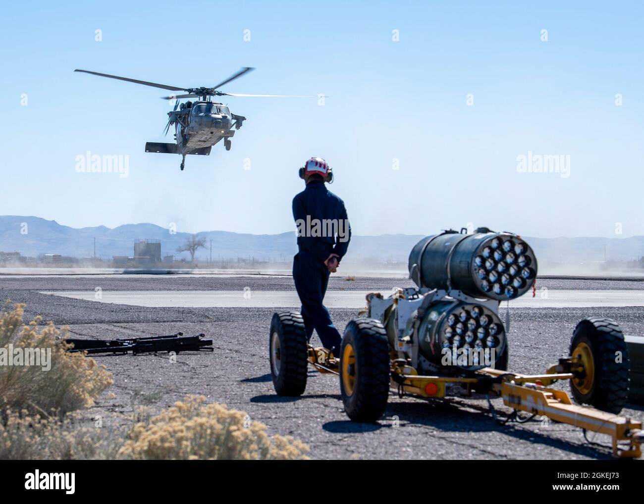 210331-N-PH222-1568 Fallon, Nev. (Mar. 31, 2021) A MH-60S Knighthawk ...