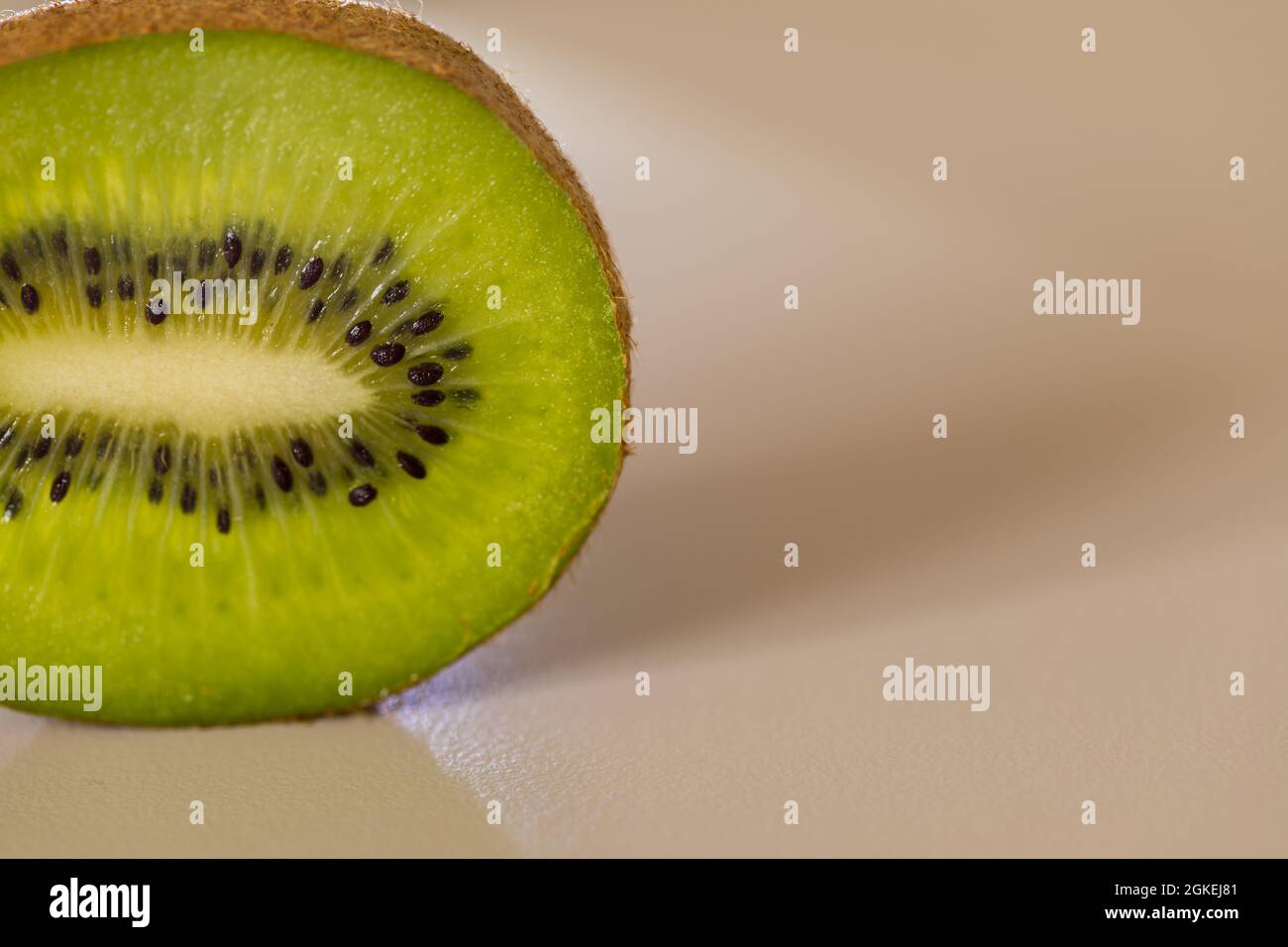 ripe kiwi - cross-section of the fruit, macro close-up Stock Photo - Alamy