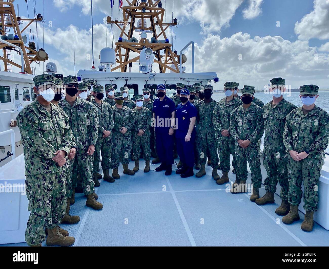 Vice Adm. Steven Poulin, commander, U.S. Coast Guard Atlantic Area, and Command Master Chief ...