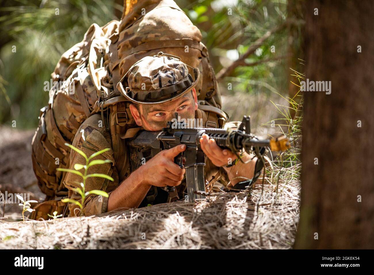 A U.S. Army Jungle School Student pulls security during their ...