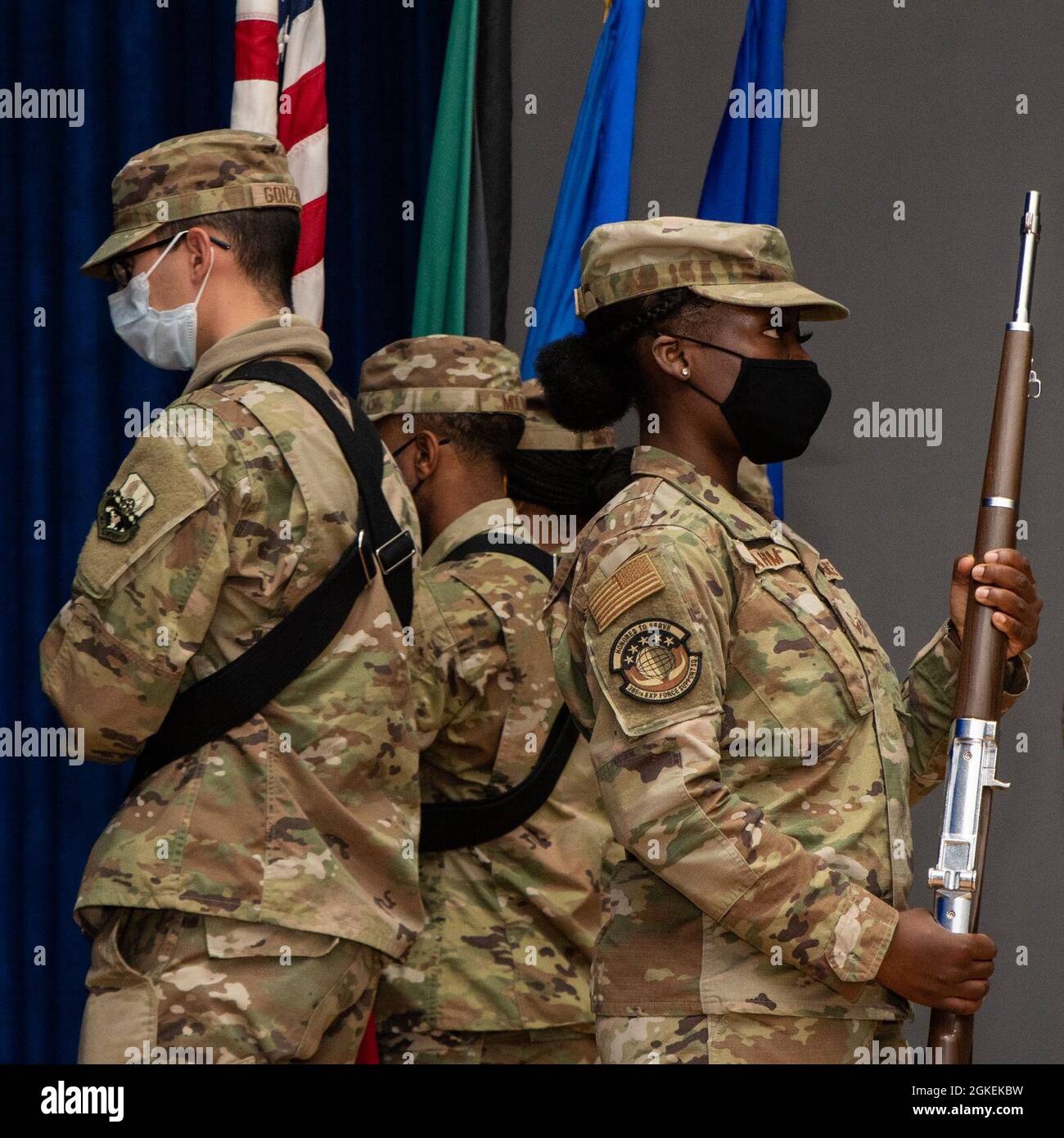Members of the 386th Air Expeditionary Wing Honor Guard, present the ...