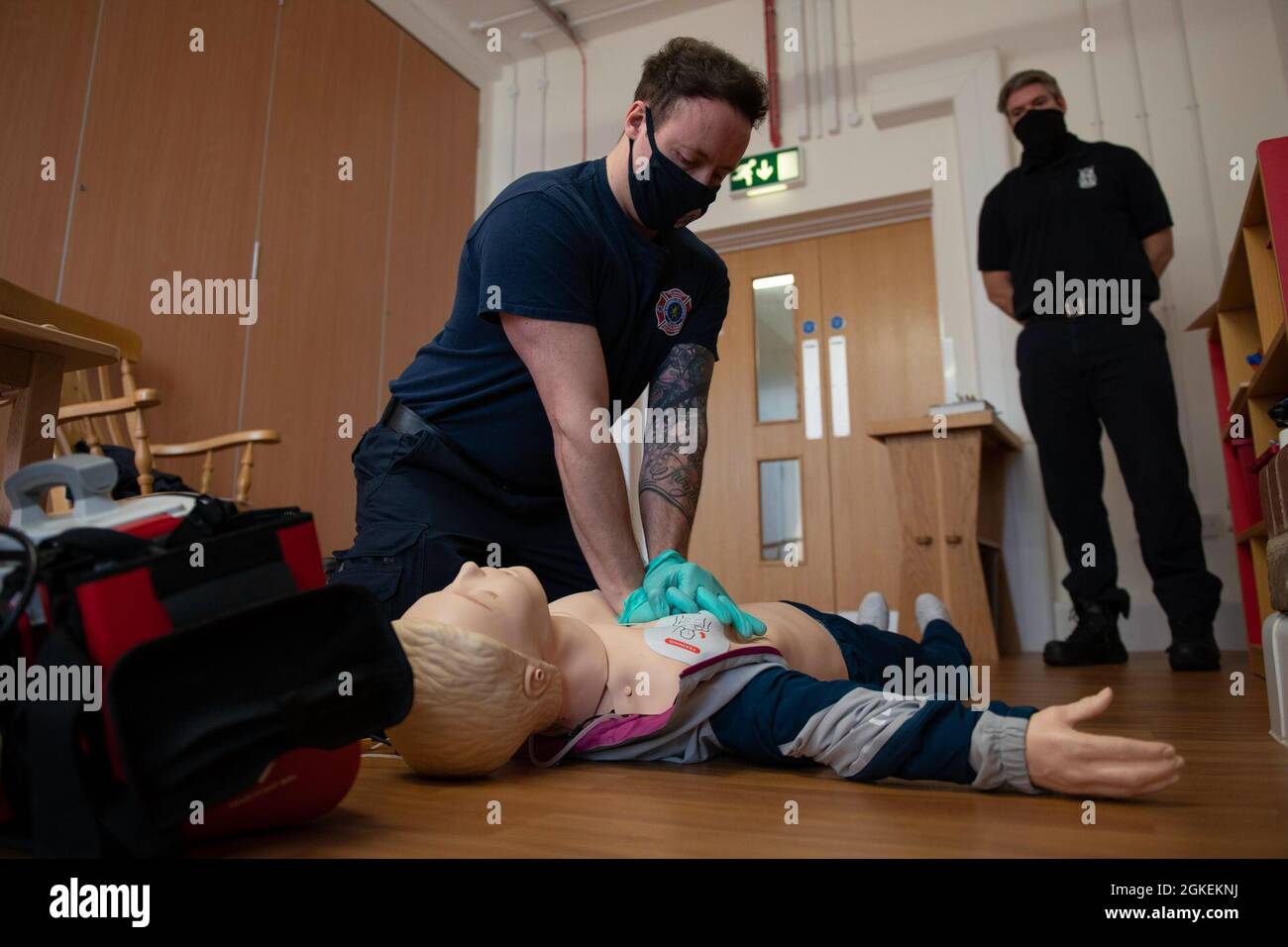 Tom Reynolds, left, 423rd Civil Engineer Squadron firefighter, conducts ...