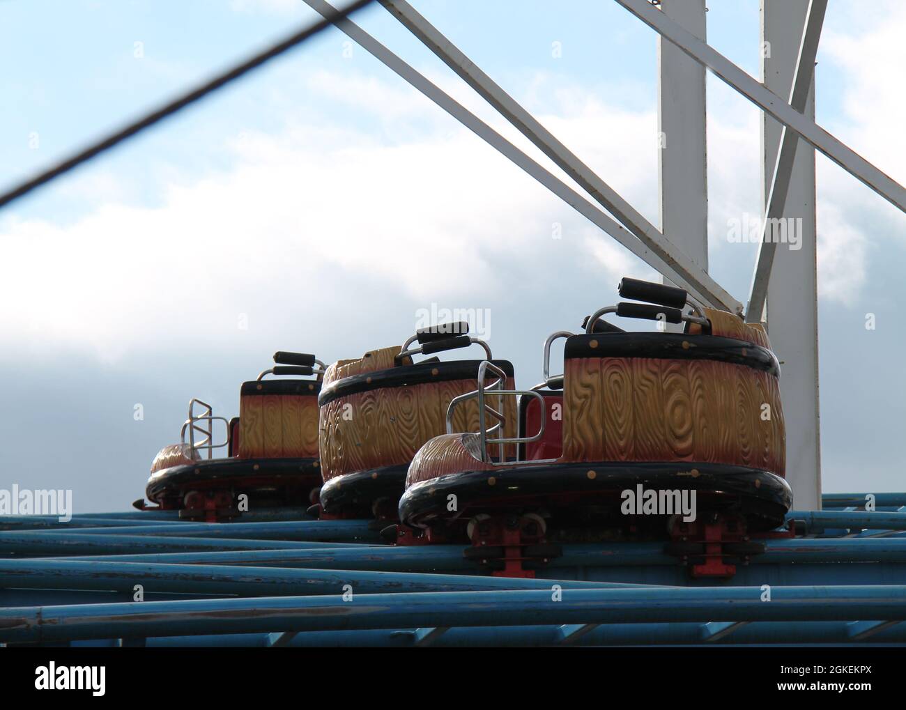 Three Carriages on a Fun Fair Roller Coaster Ride Stock Photo - Alamy