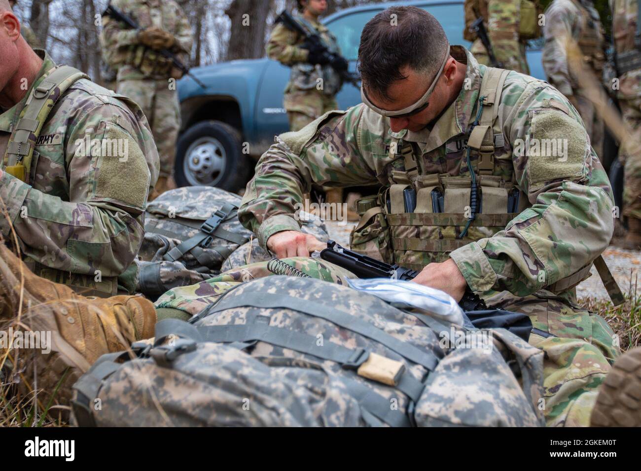 Sgt. 1st Class Ronald Roden cleans his weapon during some downtime at ...