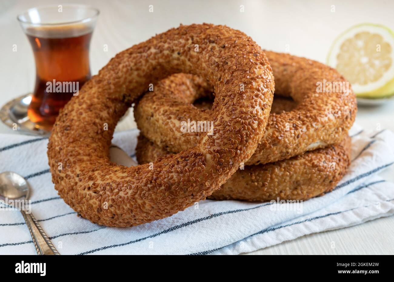 Traditional Turkish breakfast of round bagel - simit with sesame seeds ...