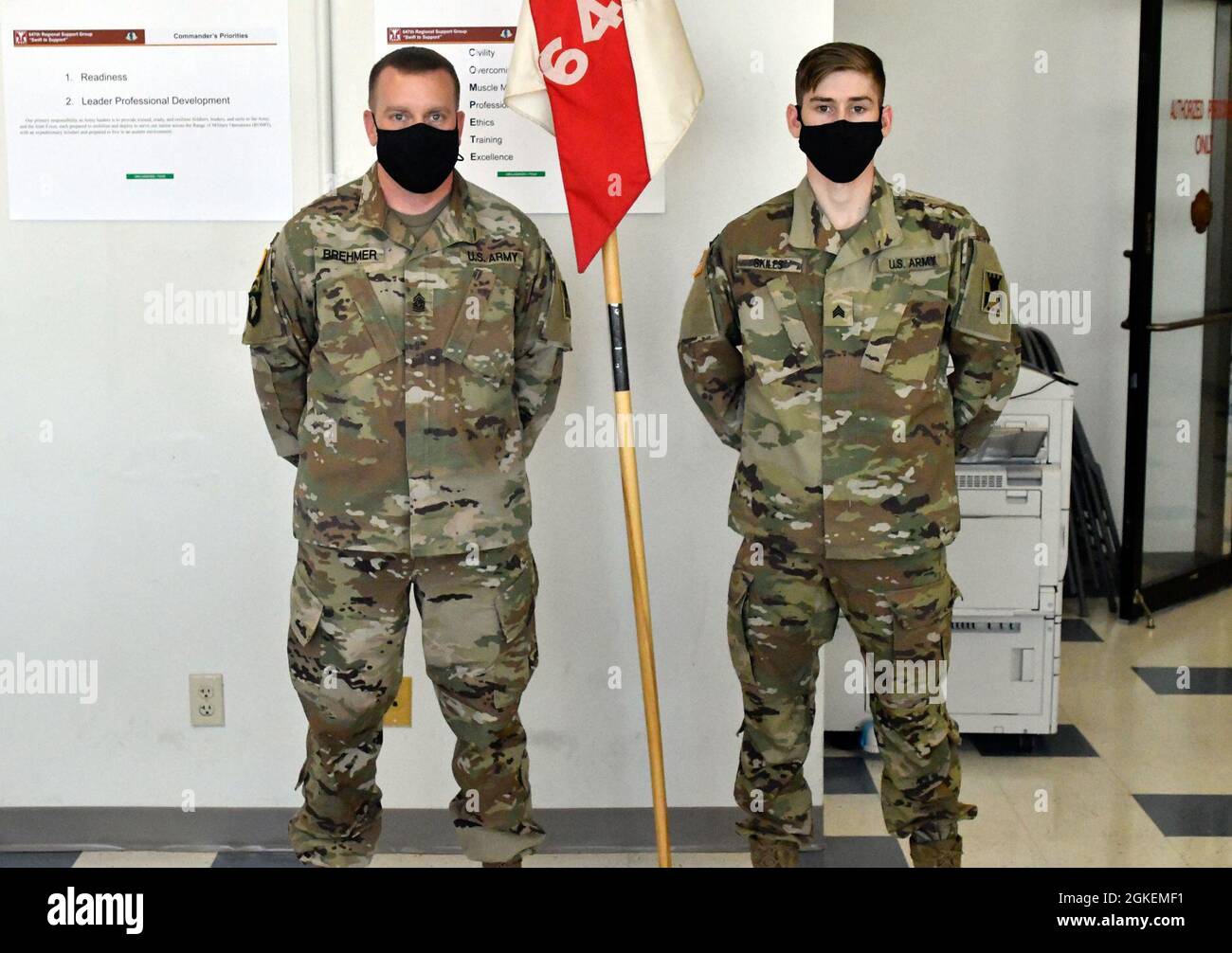 Command Sgt. Maj. Thomas Brehmer, brigade command sergeant major, left ...