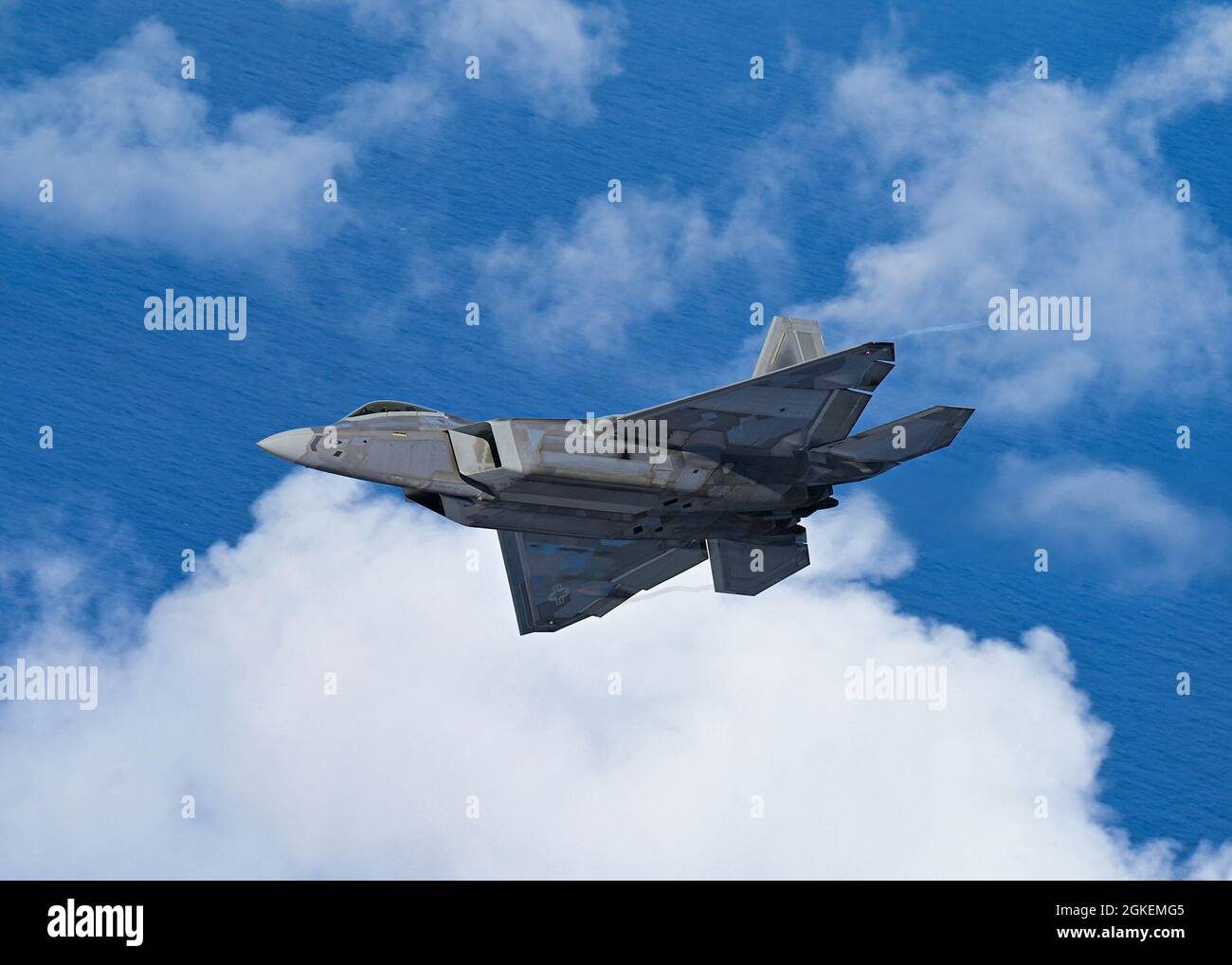 An F-22 Raptor assigned to the 19th Fighter squadron flies over Joint ...