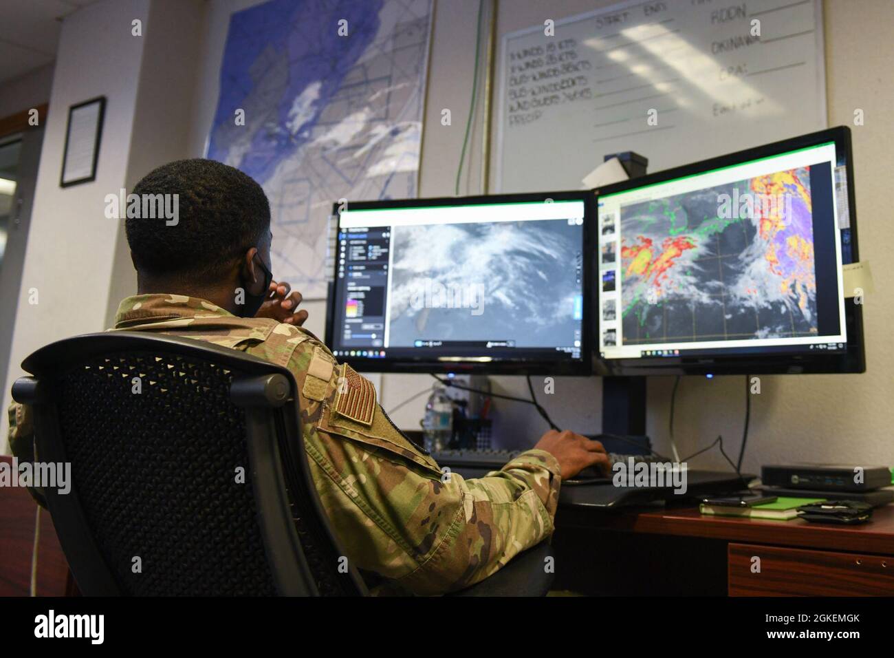 A U.S. Air Force weather forecaster from the 18th Operations Support ...
