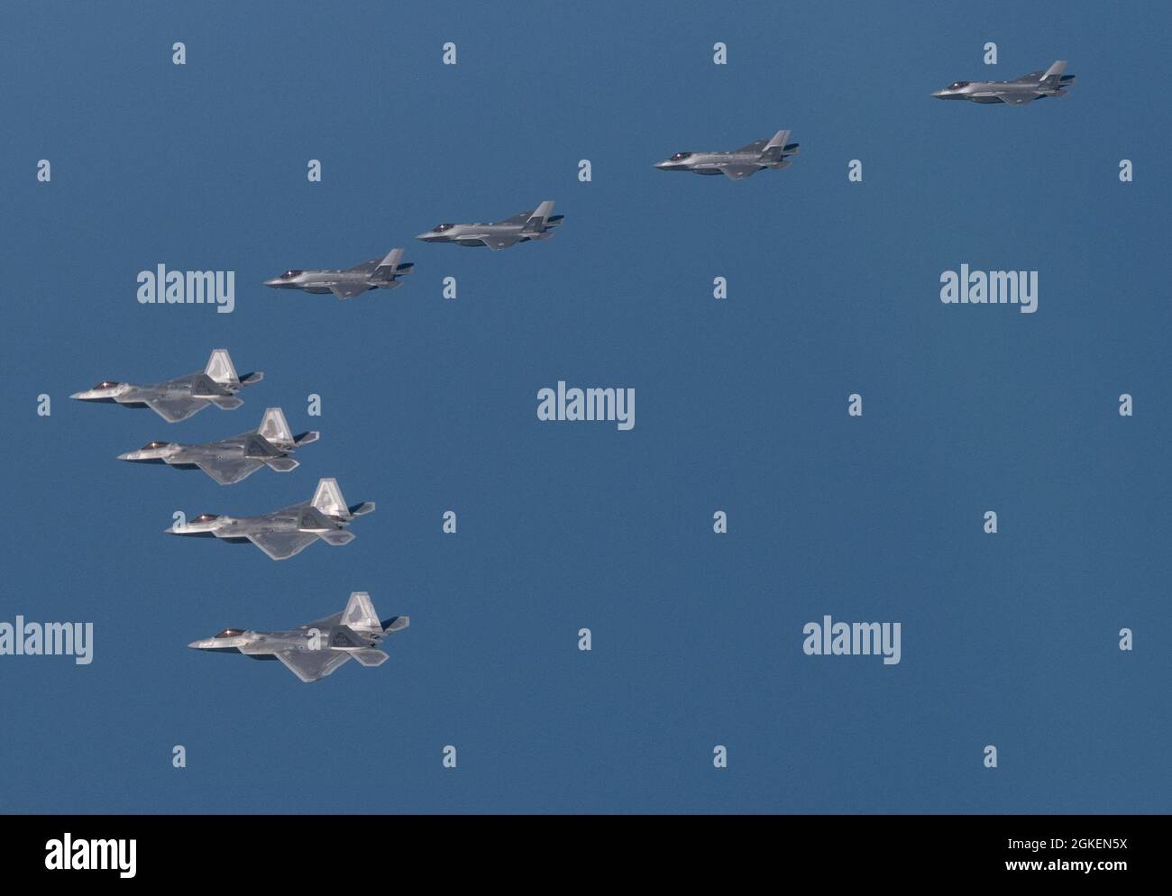 U.S. Air Force F-22 Raptors from the 199th Fighter Squadron and Japan ...