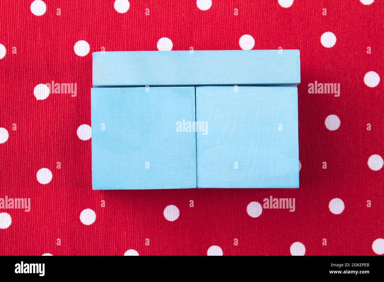 Unusual gift box. Small blue box Stock Photo - Alamy
