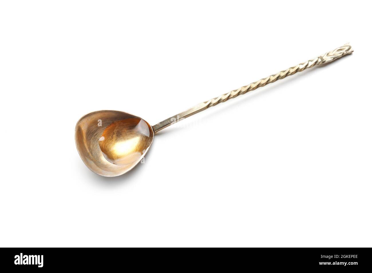 Spoon with cooking oil on white background Stock Photo - Alamy