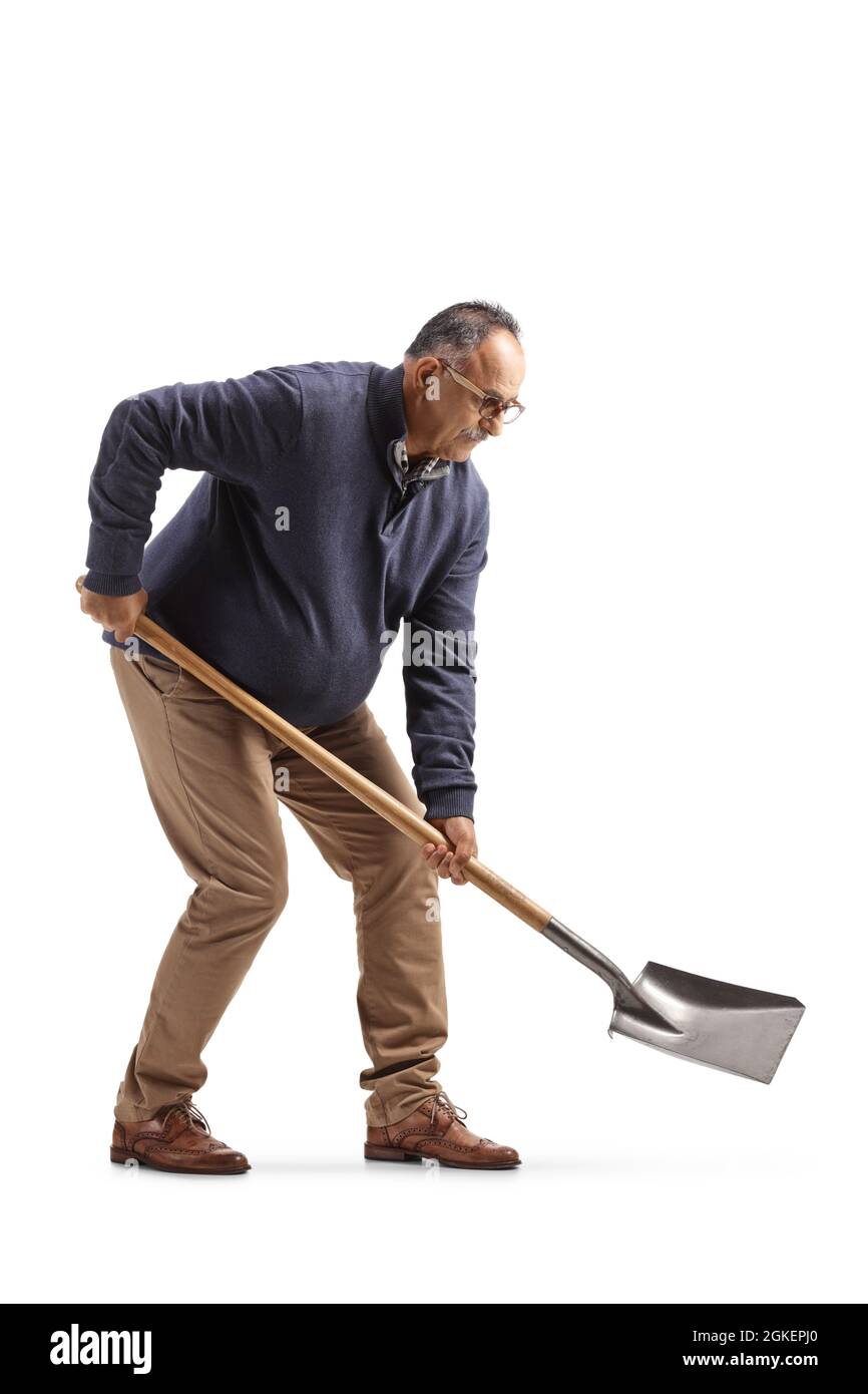 Mature man in casual clothes digging with a shovel isolated on white ...