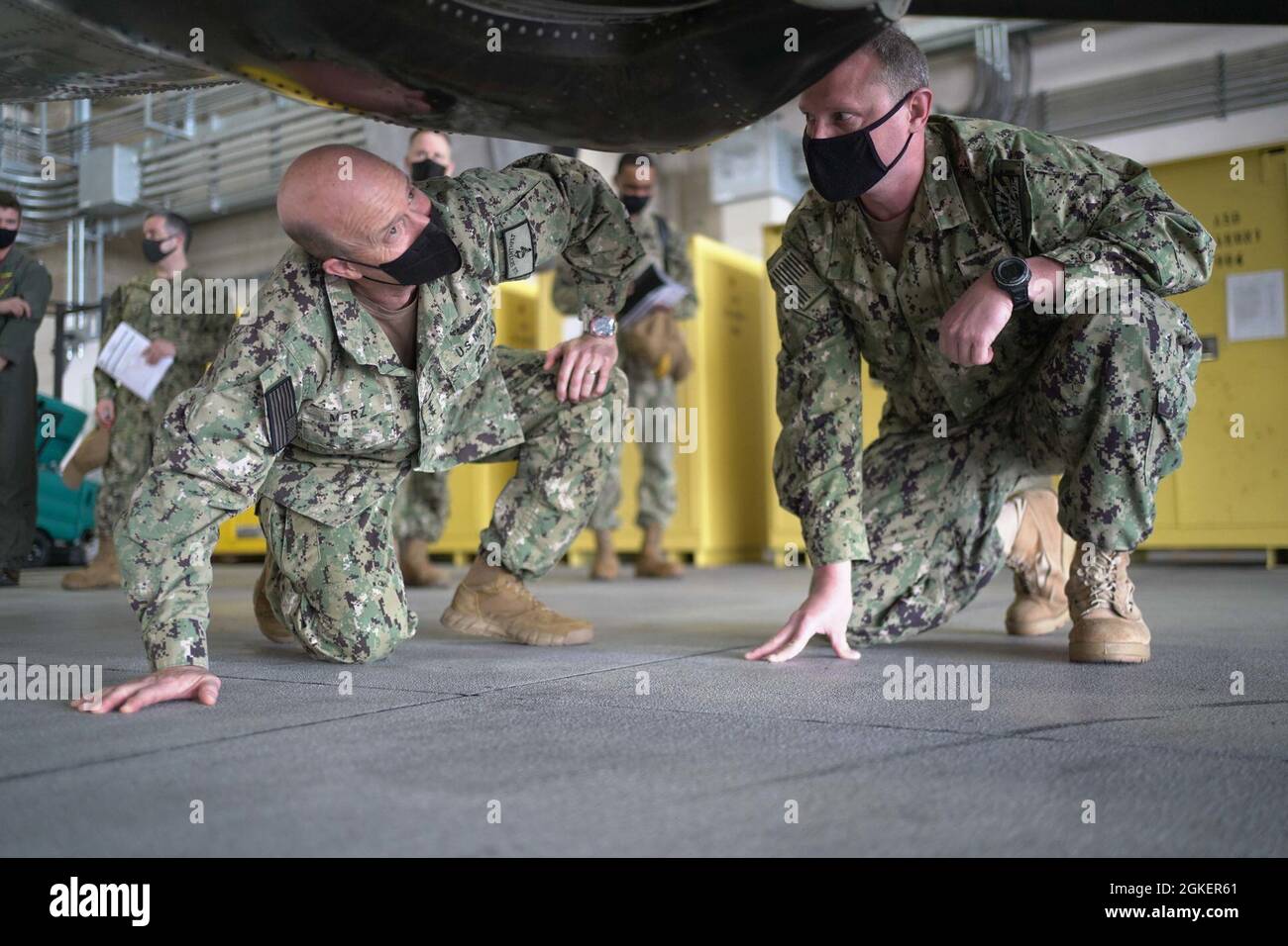 U.S. Navy Vice Admiral Bill Merz, left, commander of 7th Fleet ...