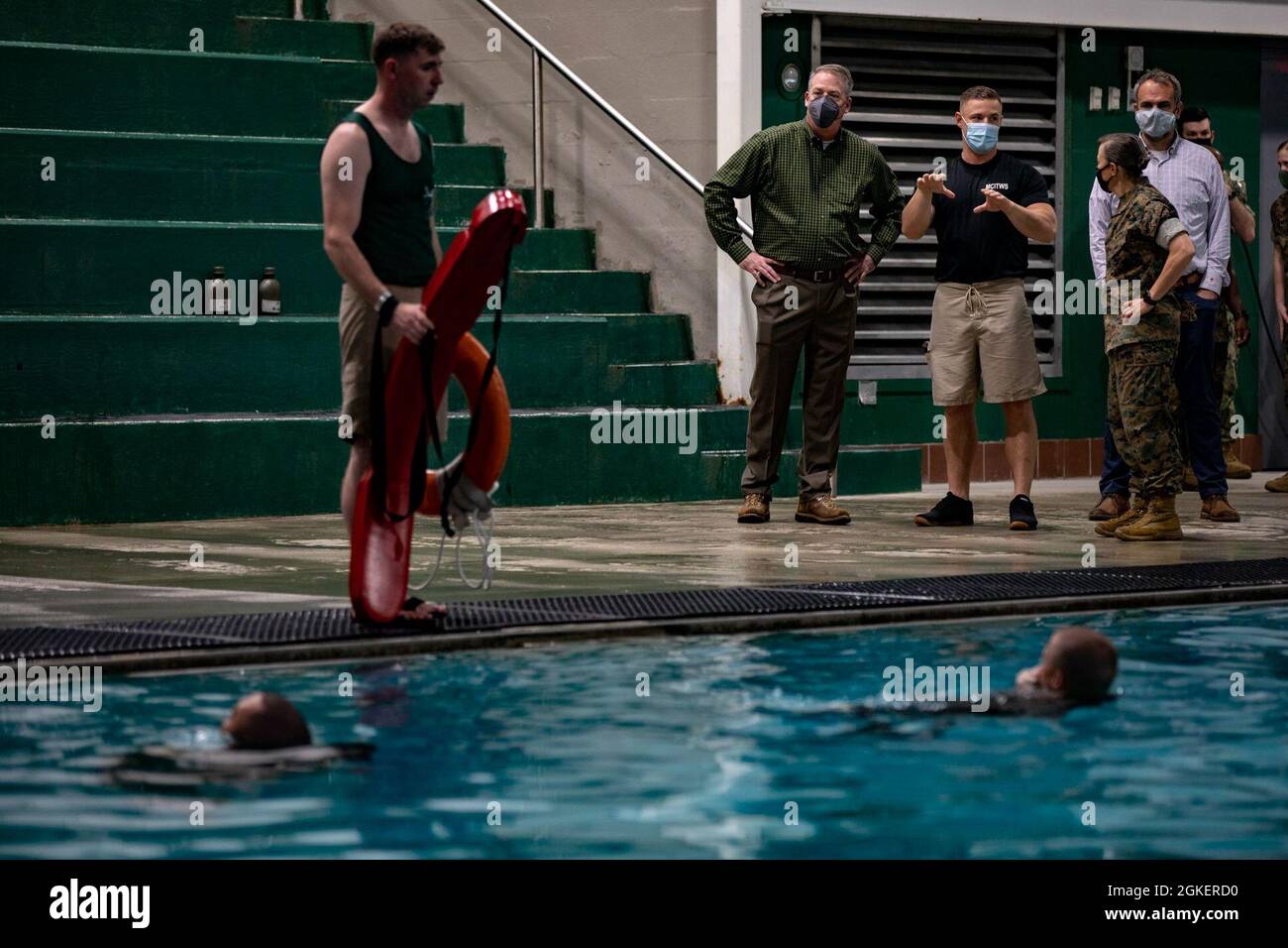 The Honorable Thomas W. Harker, Acting Secretary of the Navy, observes ...