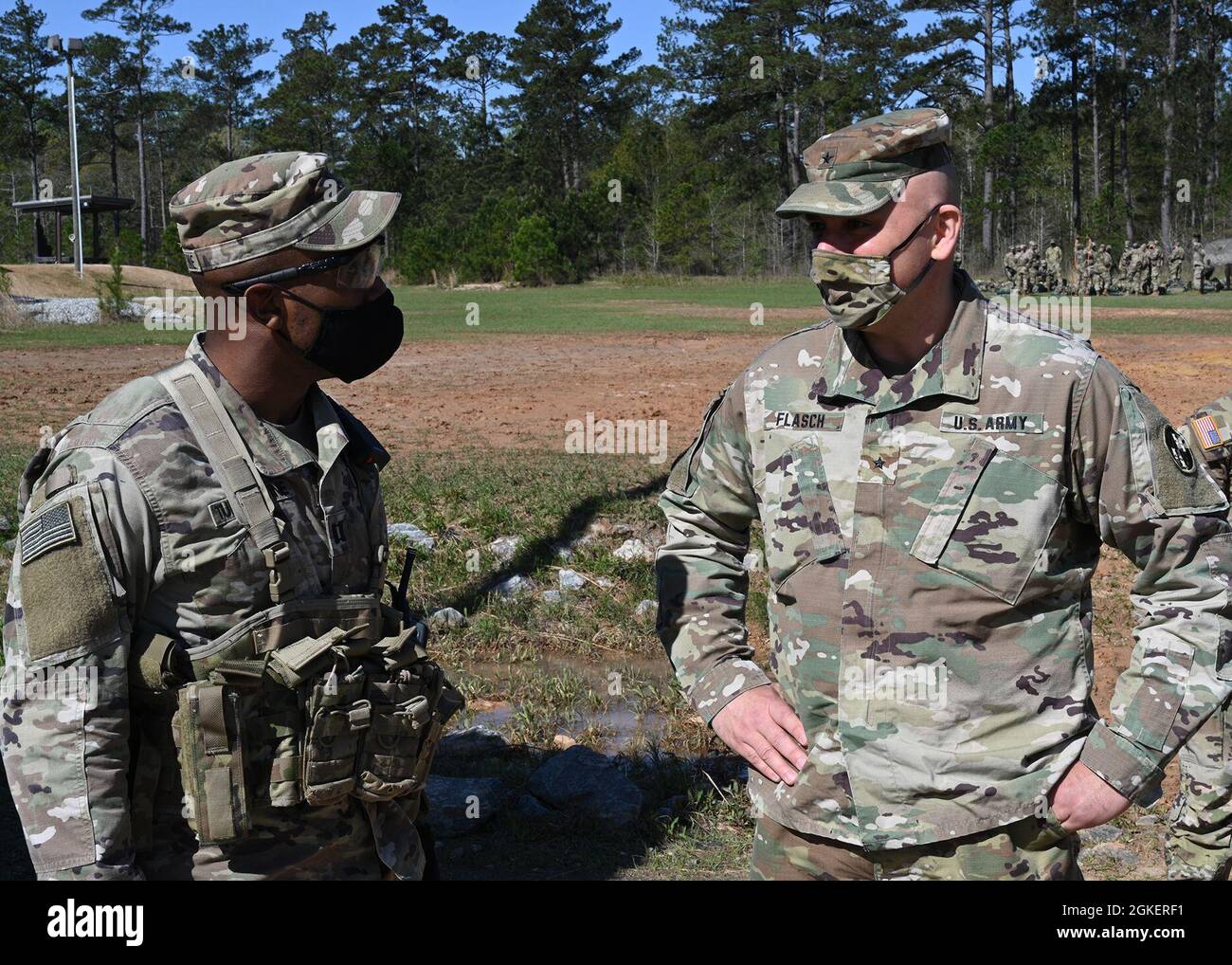U.S. Army Brig. Gen. Adam Flasch (right), director of the joint staff ...
