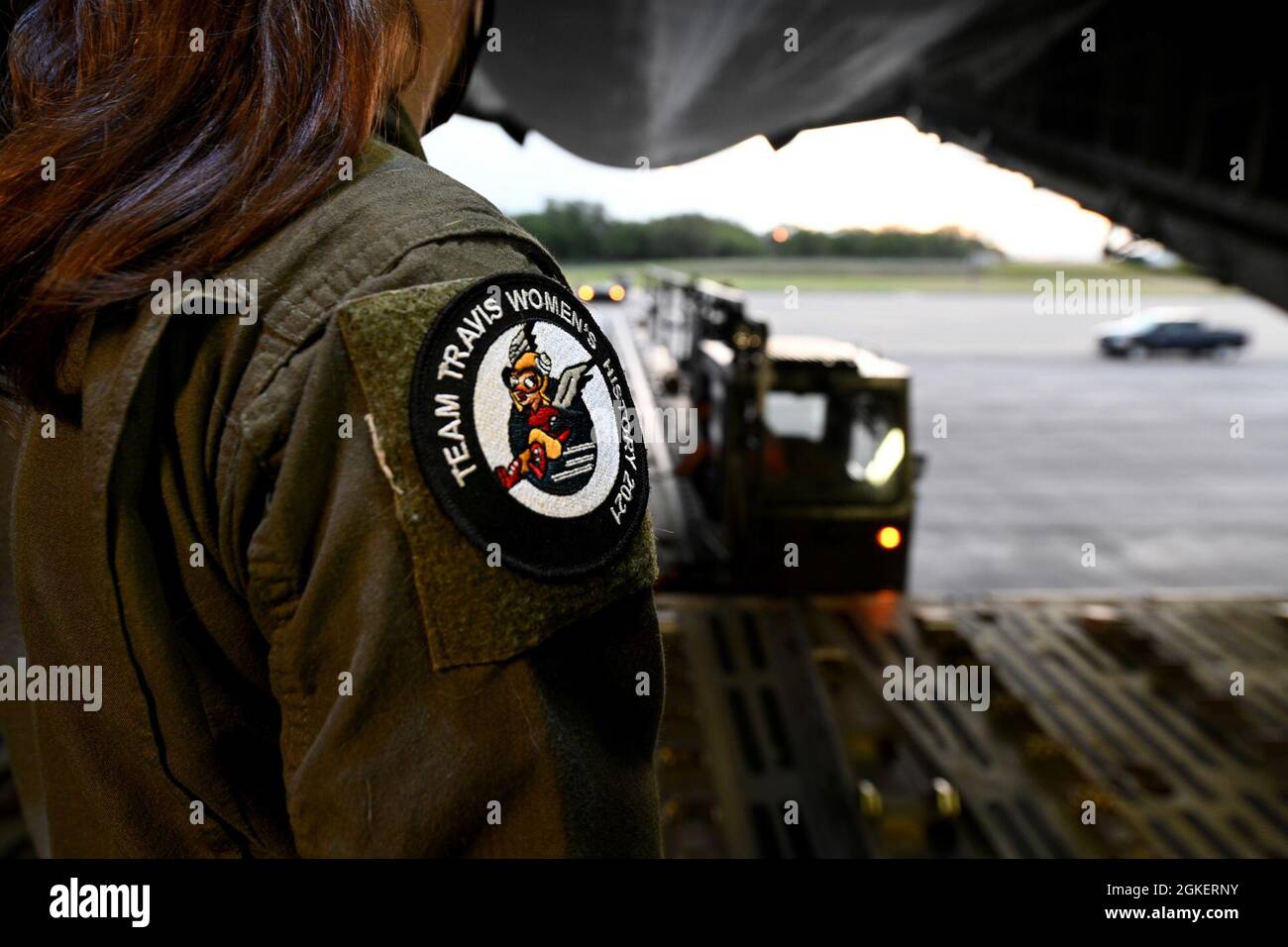 A women’s heritage flight patch is displayed on the uniform of Airman ...