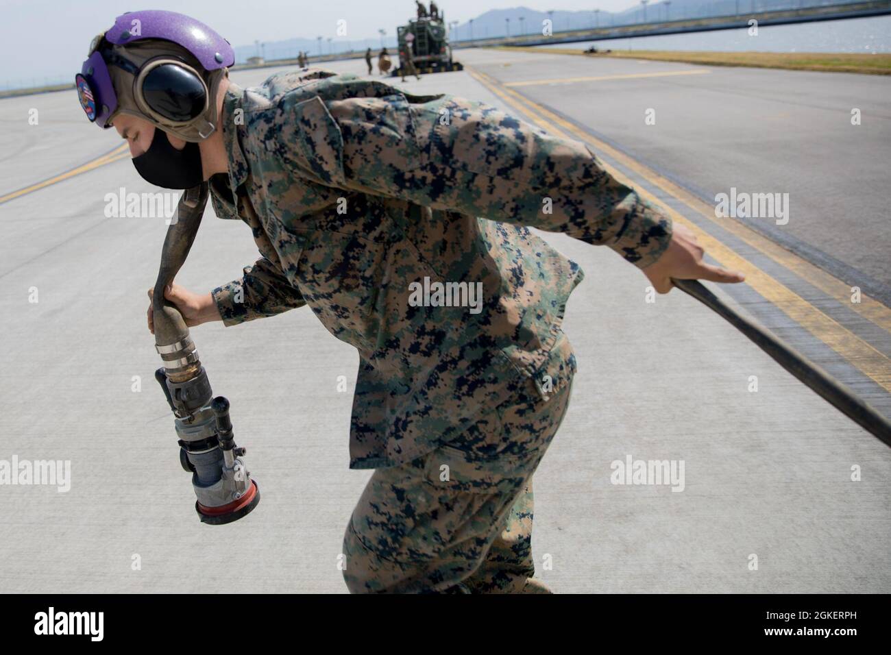 U.S. Marine Corps Cpl. Alex Cazier, a bulk fuel specialist with Marine ...
