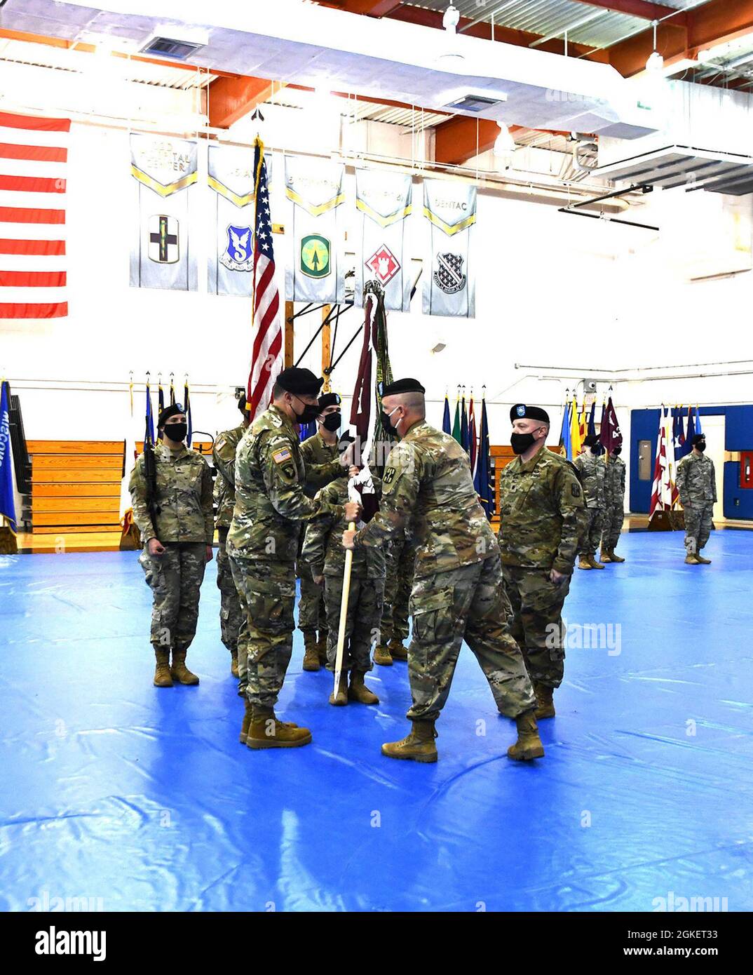 Col. Lee C. Freeman, (right) 32nd Hospital Center commander, passes the ...